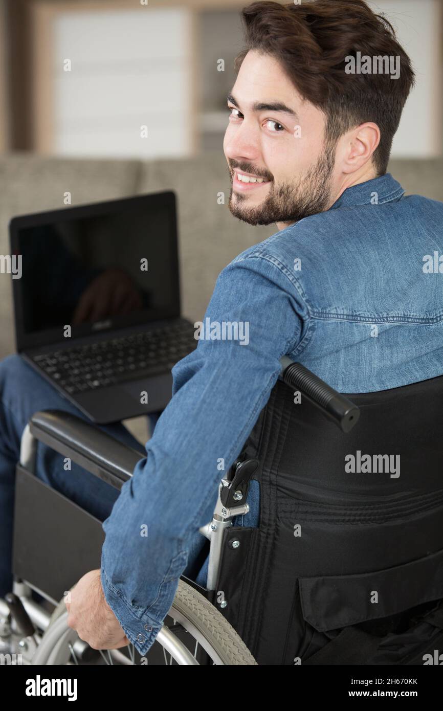 Happy smiling grandfather in wheelchair hi-res stock photography and ...