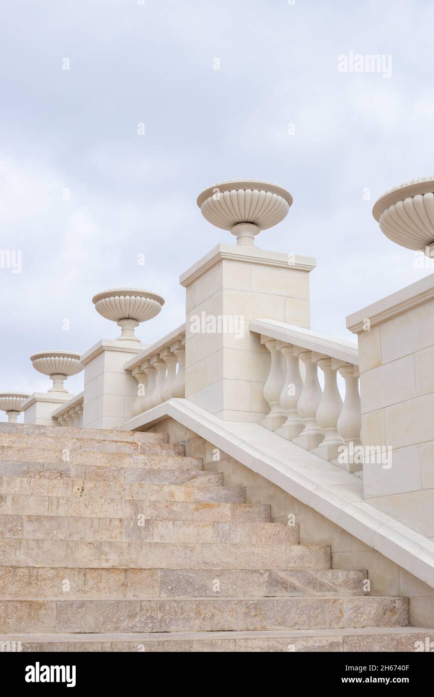 White staircase with columns leading up. Architecture and construction ...