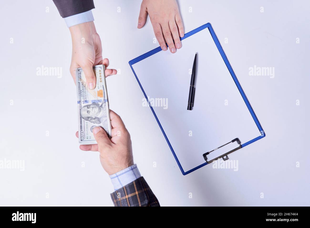 Stop corruption, bribery concepts. Giving money or bribe for signing ...