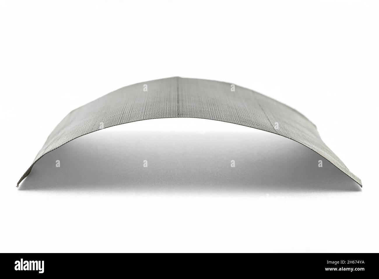 Macro photo of a fine metal mesh used for water filtration, isolated on ...