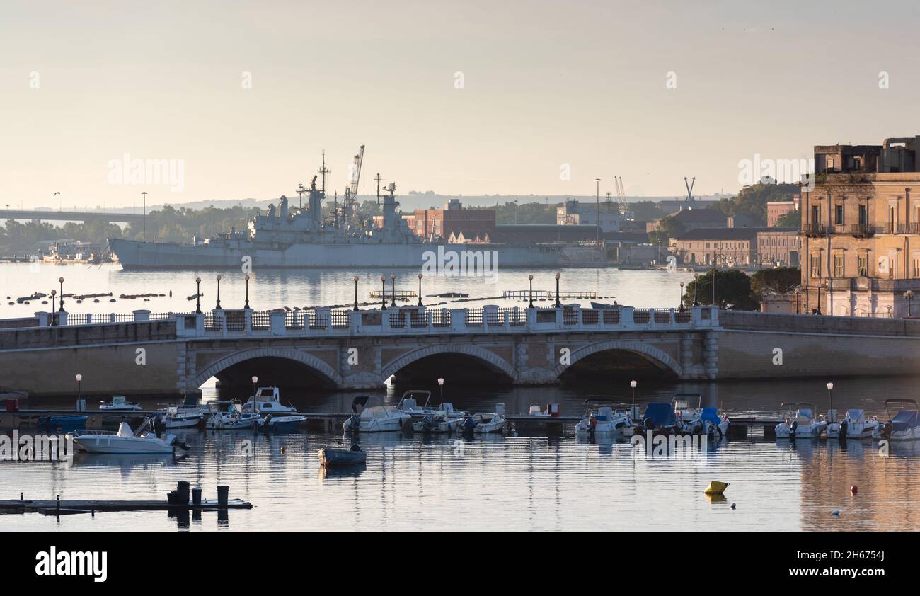 Sea port. Ships and boats at dawn. Sea town. Taranto Stock Photo - Alamy