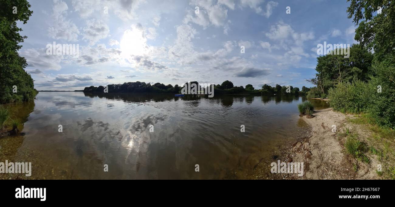 Beautiful landscape at a lake with a reflective water surface Stock ...