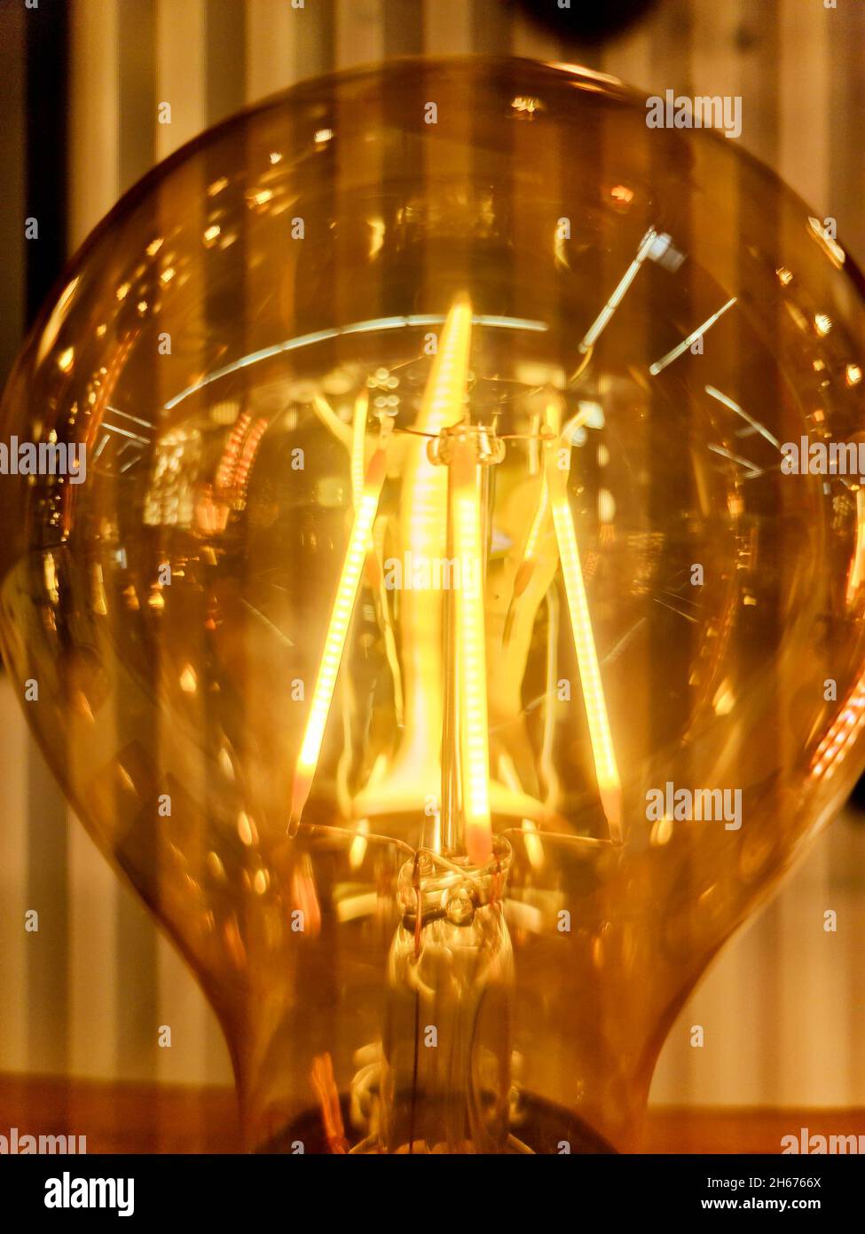 Close up view of vintage light bulbs with warm yellow light Stock Photo ...