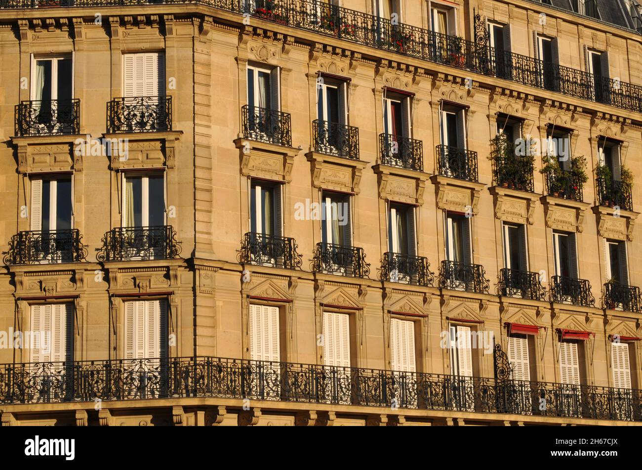 Ornate balcony railings decorate a residential building on Île Saint ...