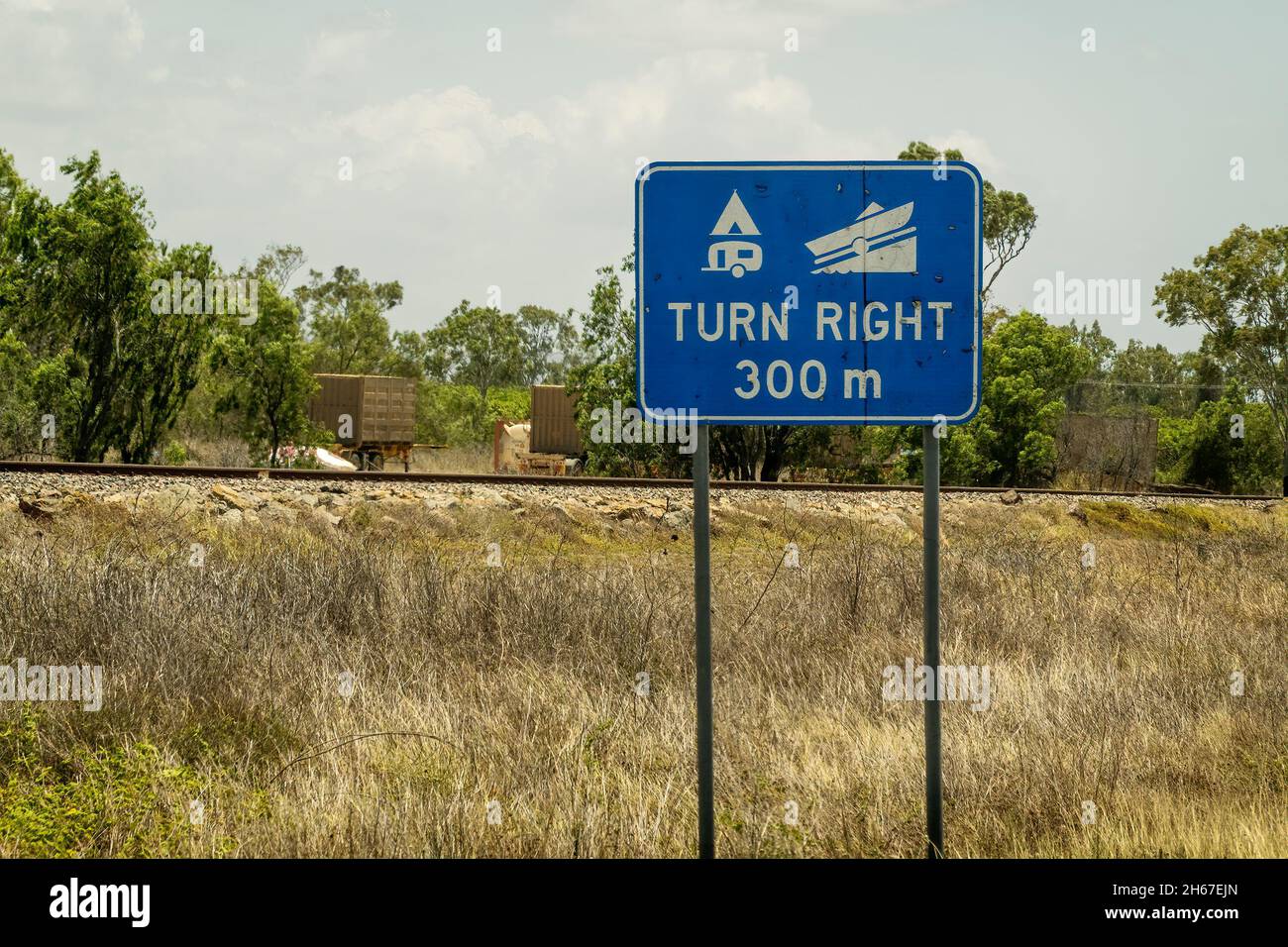 Sign denoting a caravan and camping area and boat ramp on the right in ...
