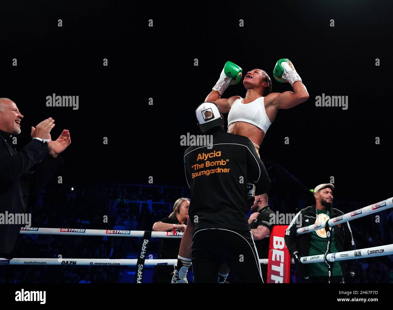 Alycia Baumgardner celebrates victory by knockout against Terri Harper ...