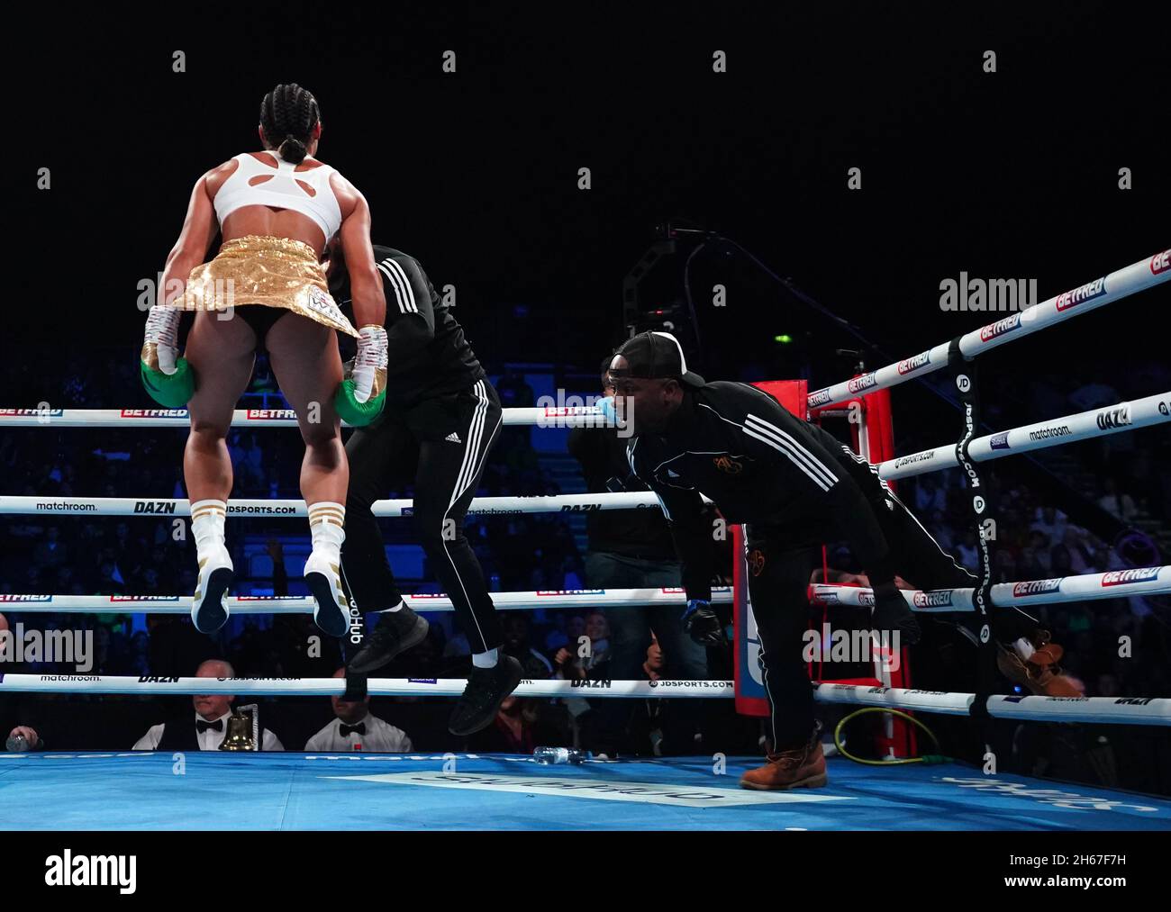 Alycia Baumgardner celebrates victory by knockout against Terri Harper ...