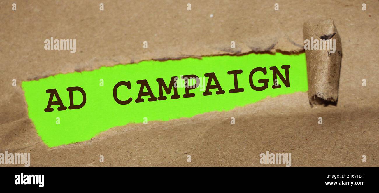 Ad campaign typed under torn paper. Marketing advertising targeting ...