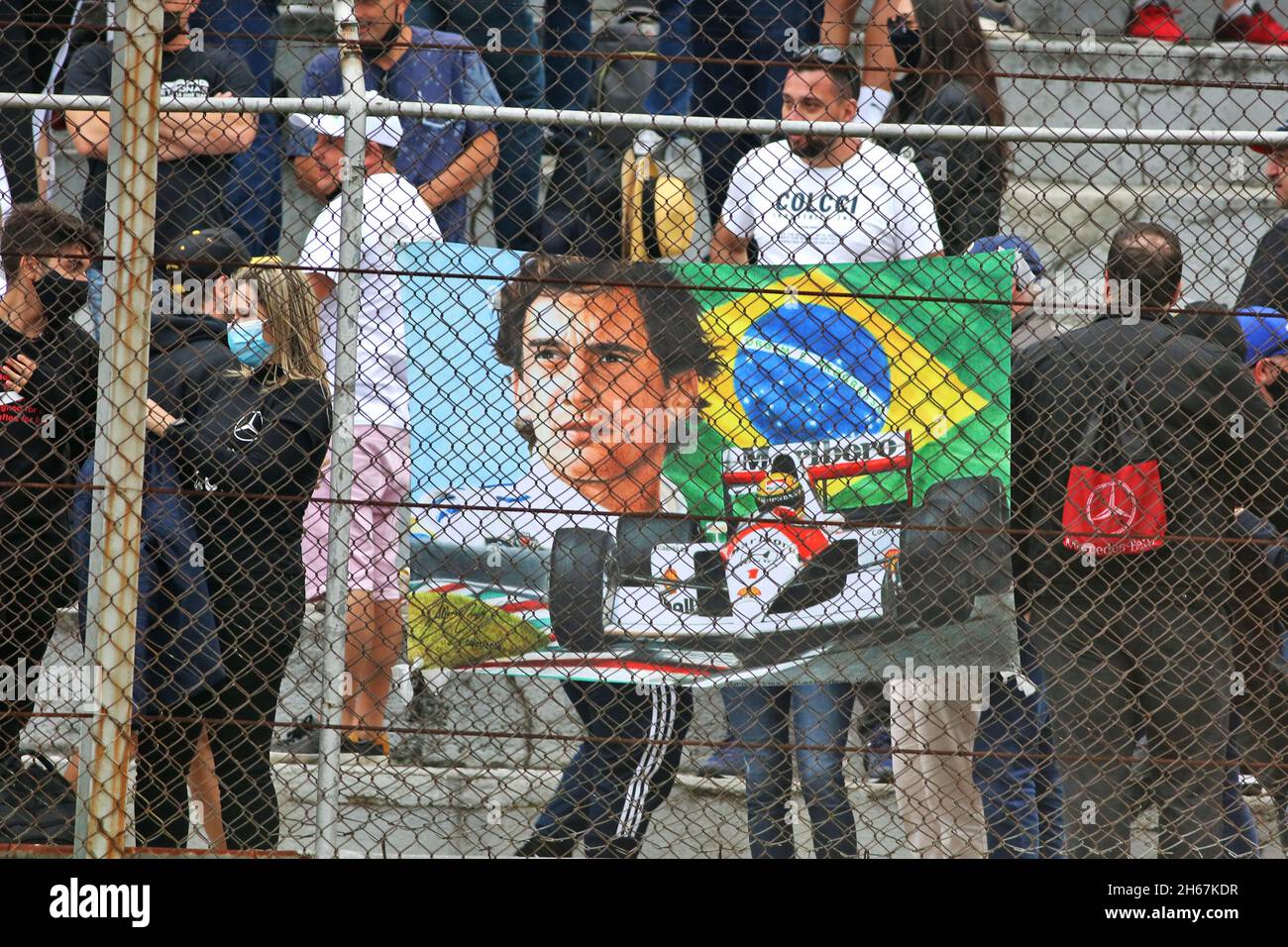 Circuit atmosphere - banner for Ayrton Senna with fans in the ...