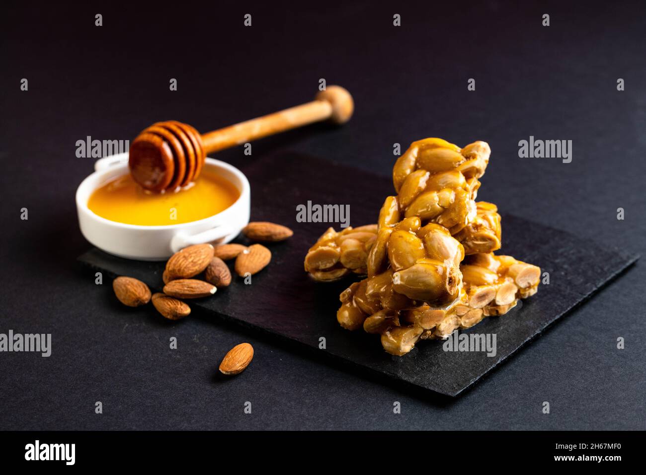 Traditional Christmas Spanish sweets - turron made of honey, sugar and ...