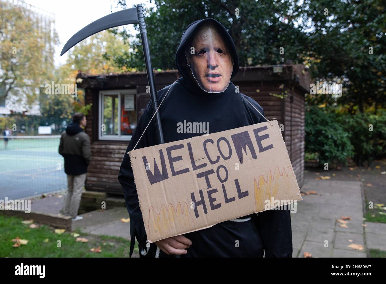 London, UK. 13th November, 2021. An Extinction Rebellion climate ...