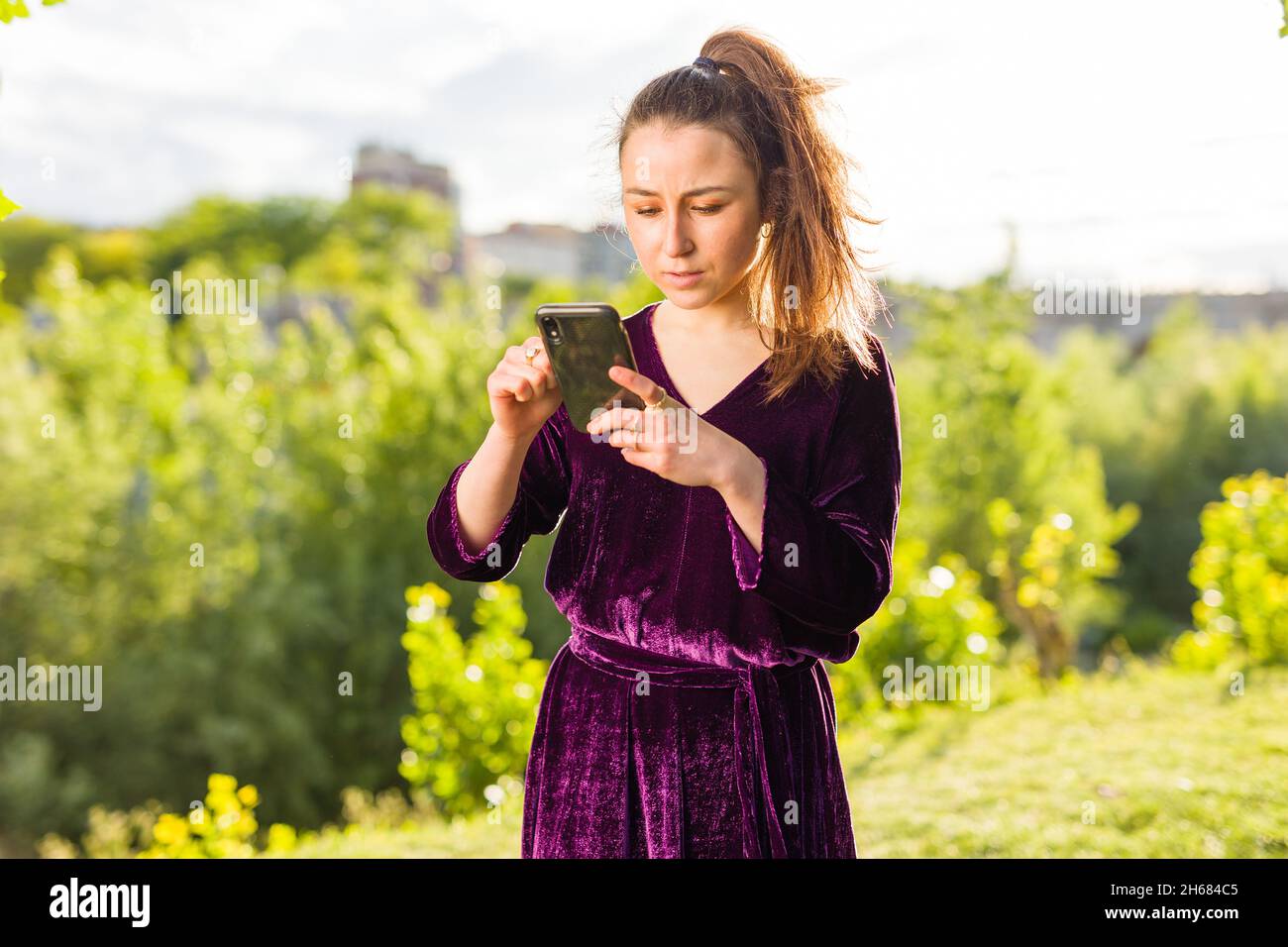 smartphone technology using by a hispanic young woman ballerina Stock ...