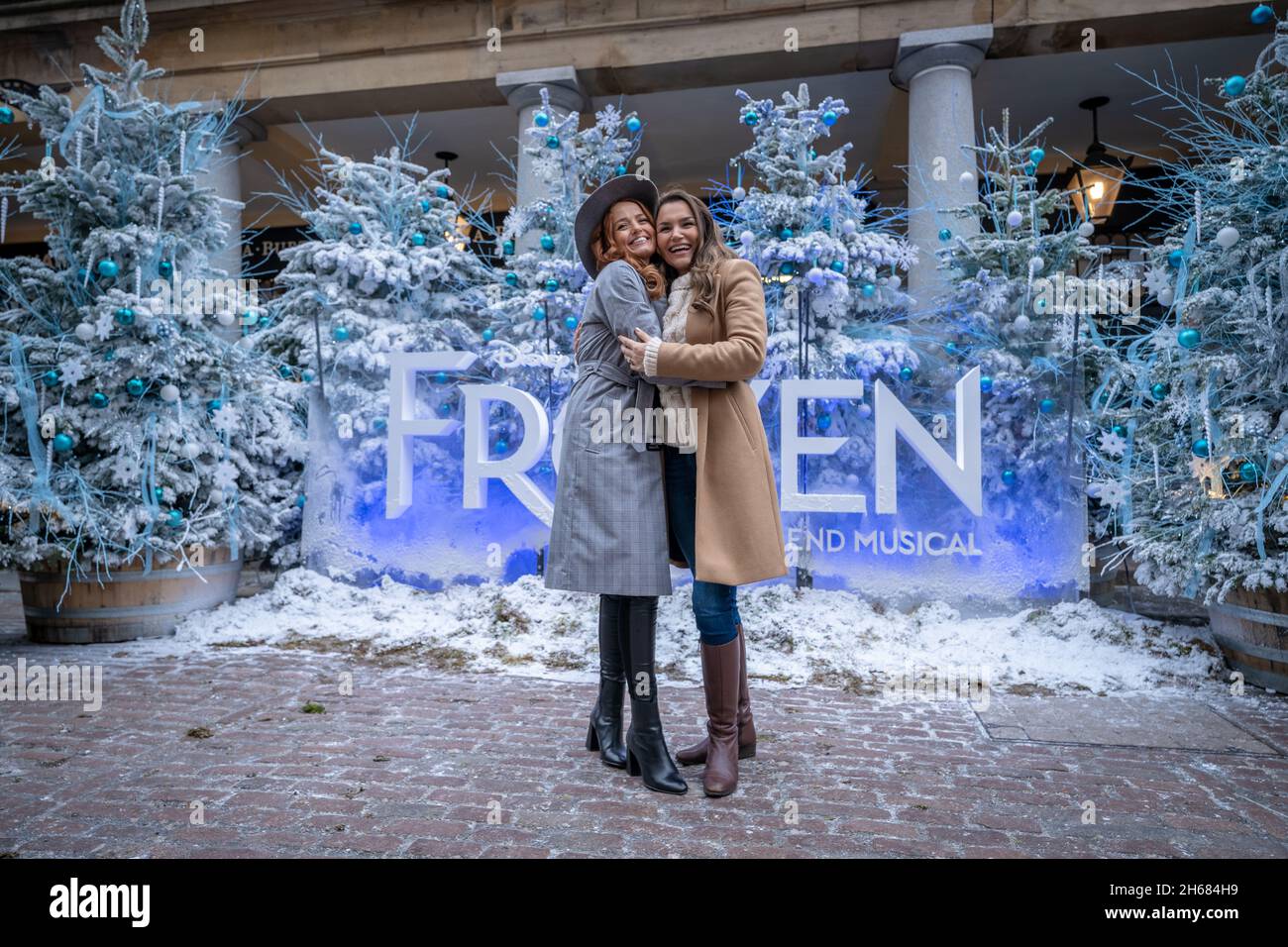 Cast of Disney theatre production: ‘Frozen: The Musical’, including Stephanie McKeon(L) as Anna ...