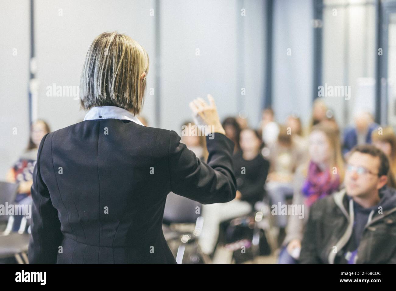Female giving speech podium hi-res stock photography and images - Alamy
