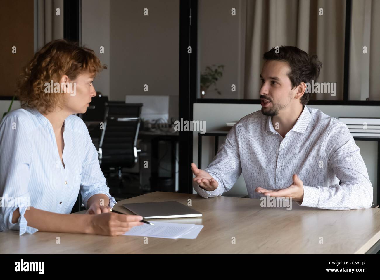 Young female hr manager holding job interview with candidate Stock ...