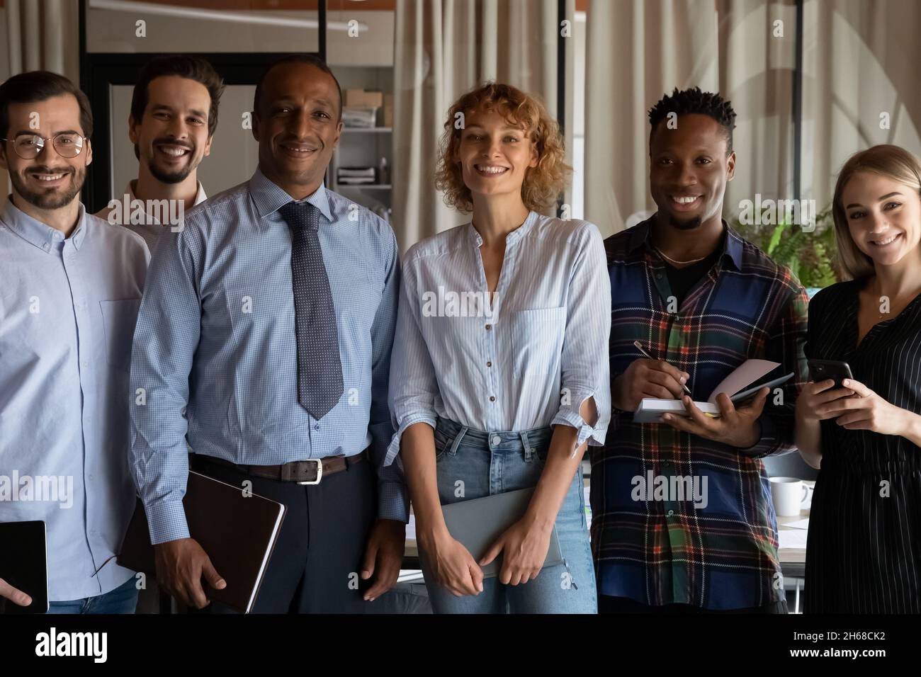 Happy millennial african manager posing hi-res stock photography and ...