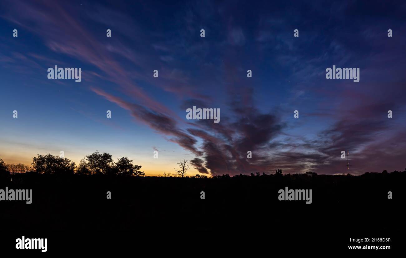 Bright contrasting blue sky with color gradient Stock Photo - Alamy