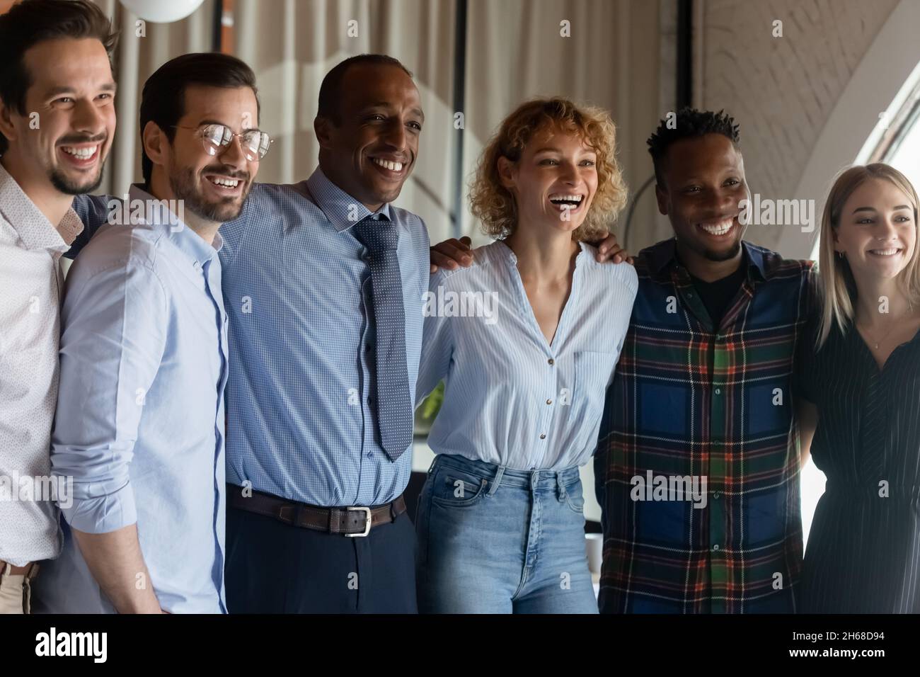 Happy diverse multiracial teammates showing friendly relations Stock ...