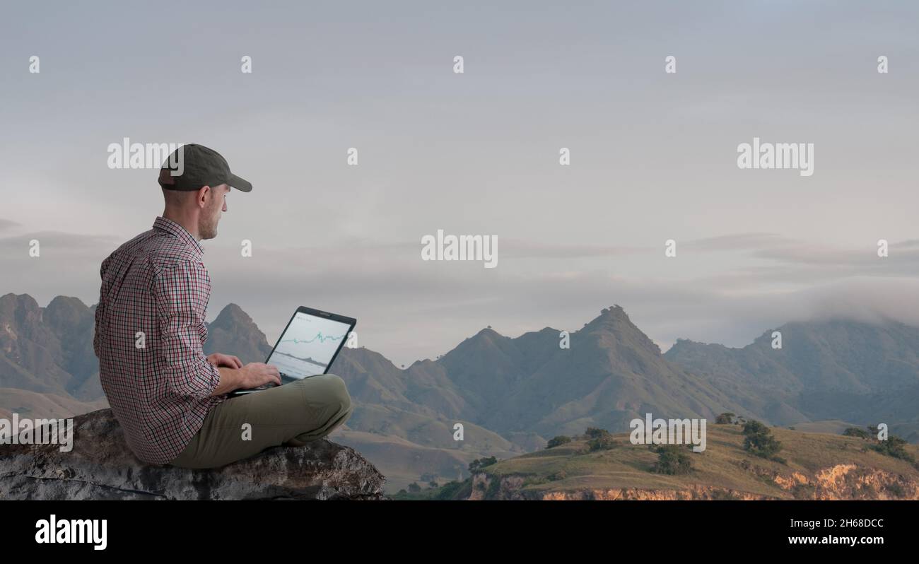 Working remotely outdoors hi-res stock photography and images - Alamy