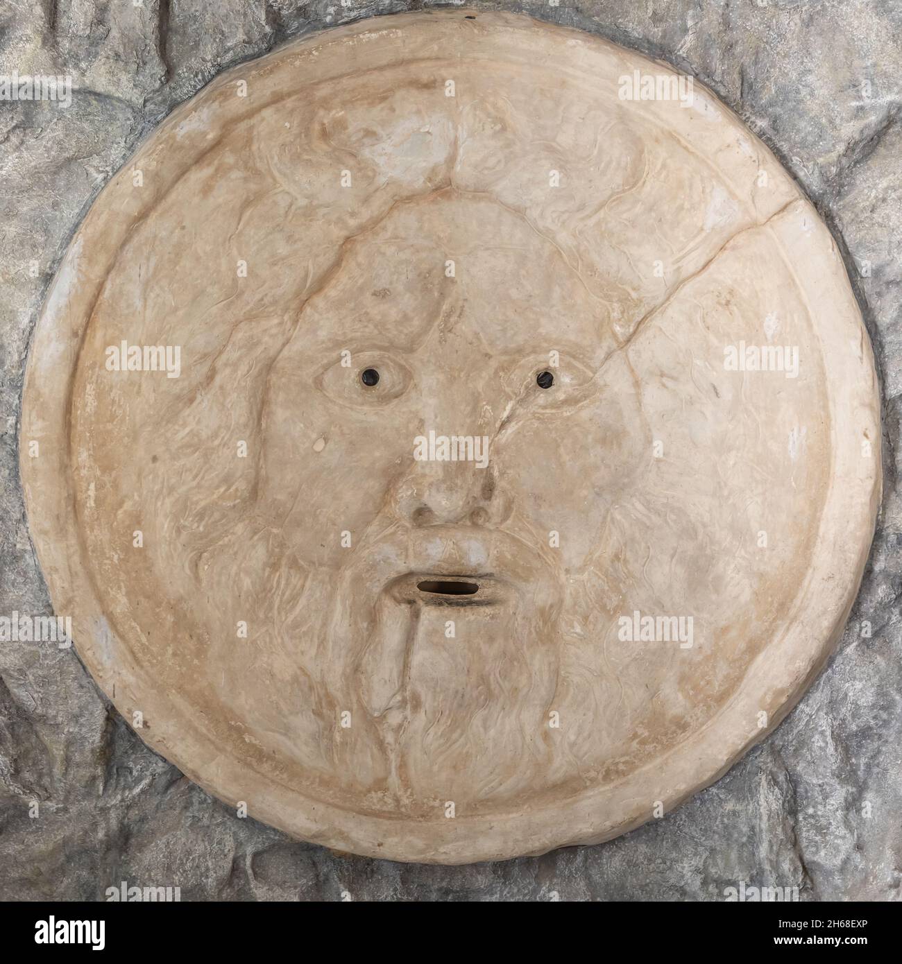 Mouth of truth sightseeing in Rome, Italy. Historical sculpture made of ...
