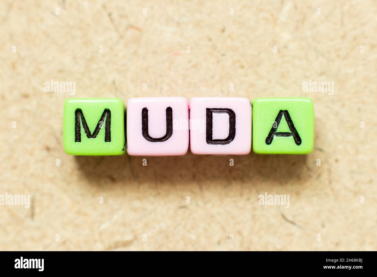 Color alphabet letter block in word muda on wood background Stock Photo ...