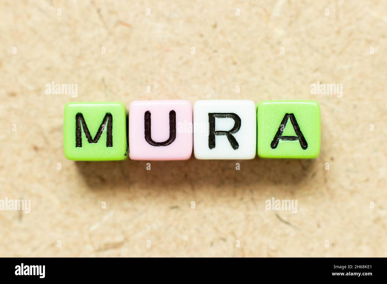Color alphabet letter block in word mura on wood background Stock Photo ...