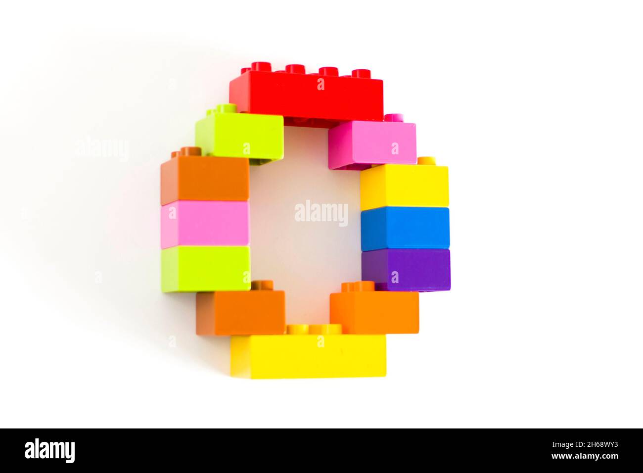 Colorful toy brick letter O isolated on the white background Stock ...