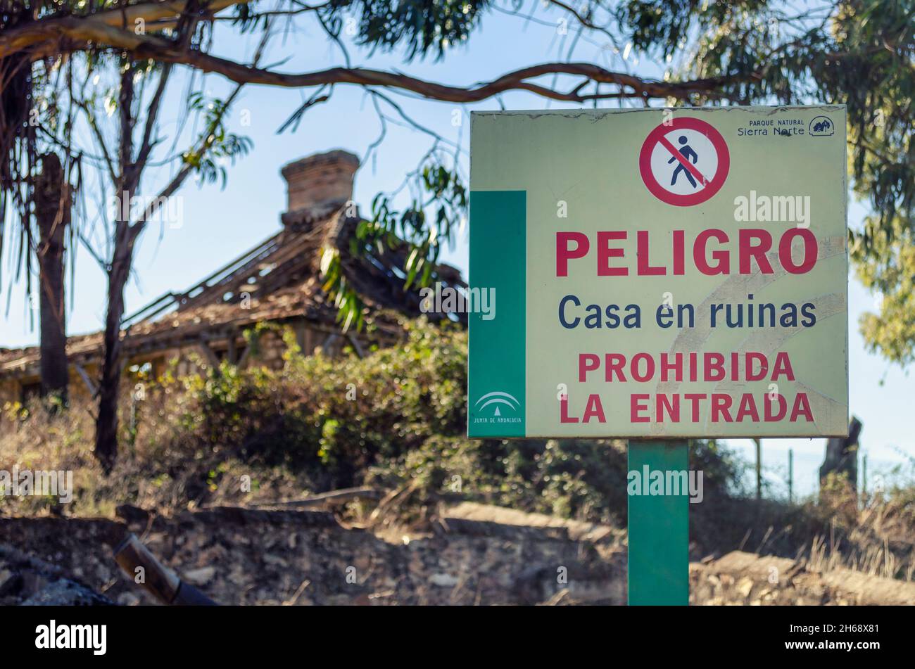 A No trespassing sign on an abandoned house in the countryside. (Danger ...