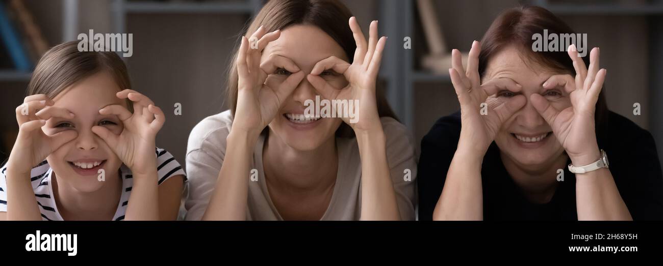 Portrait of happy three generations of women making funny faces Stock ...