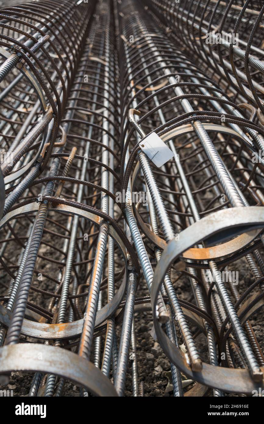 close up of structural steel bound into round baskets for the erection ...