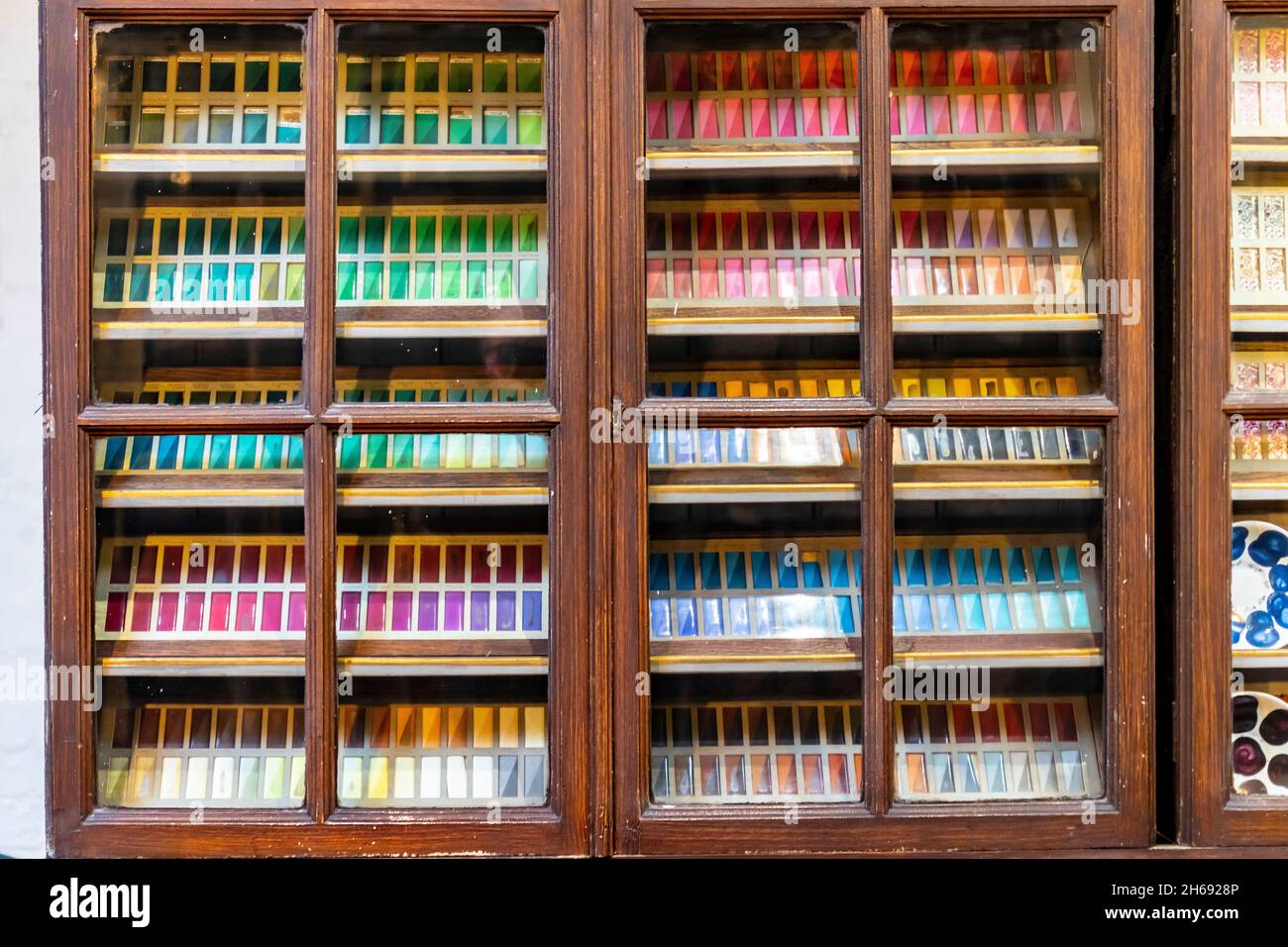 glaze colour test samples in display cabinet at Gladstone Pottery ...