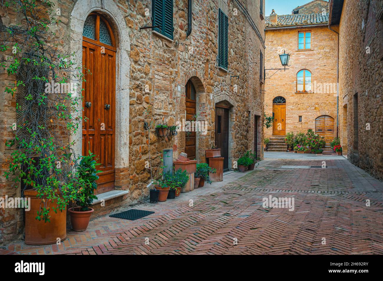 Traditional tuscan stone houses and fantastic entrances decorated with ...