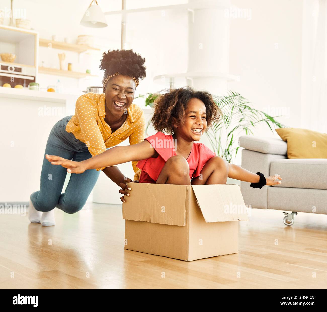 child family mother fun happy girl happiness daughter box together ...