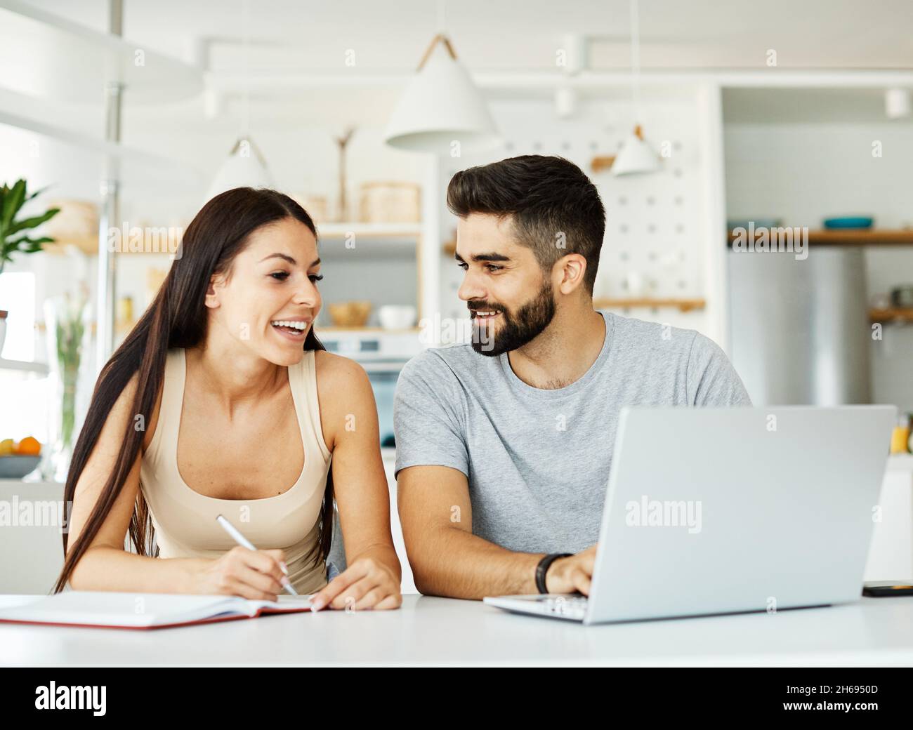 laptop woman man couple computer indoor technology young together ...