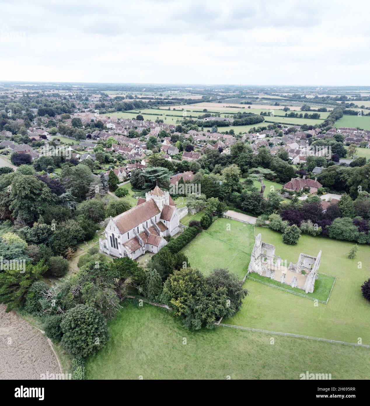 view of the village boxgrove from above with the ruined priory and the ...