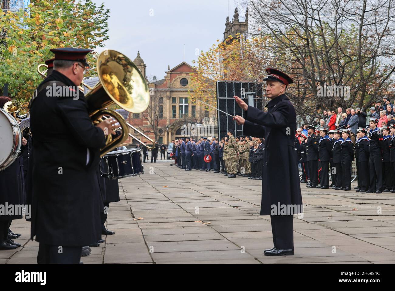 The Salvation Army band conductor and his band play to the crowd during ...