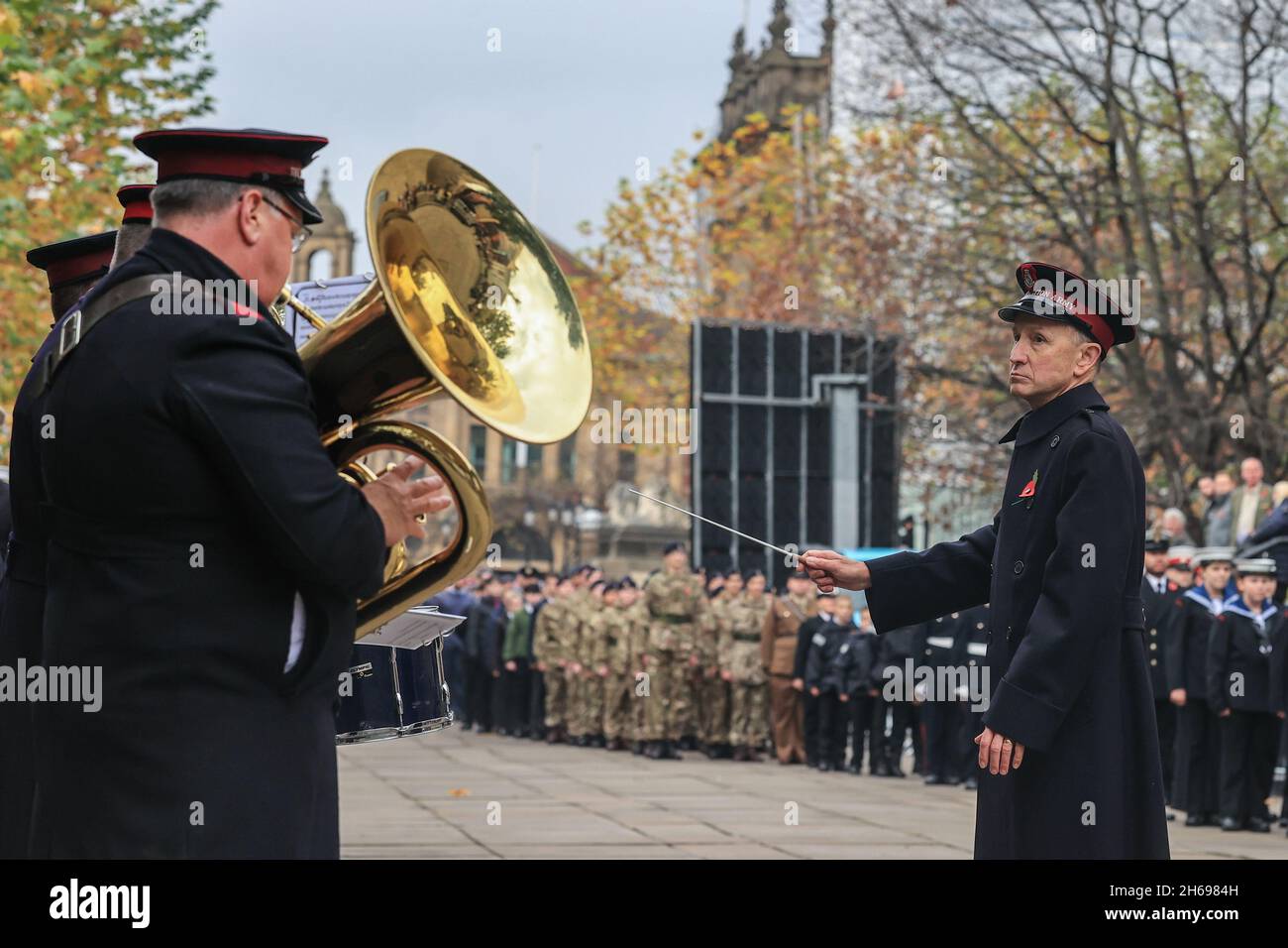 The Salvation Army band conductor and his band play to the crowd during ...