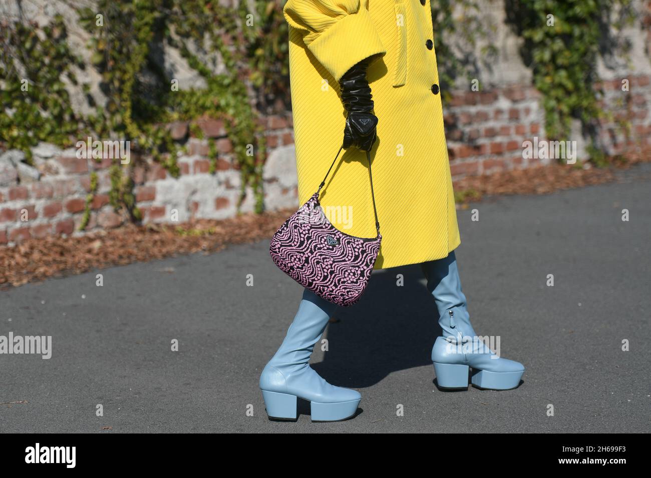 Woman black leather prada hi-res stock photography and images - Alamy