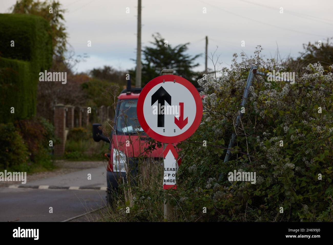 Road sign of oncoming vehicles have to give way Stock Photo - Alamy