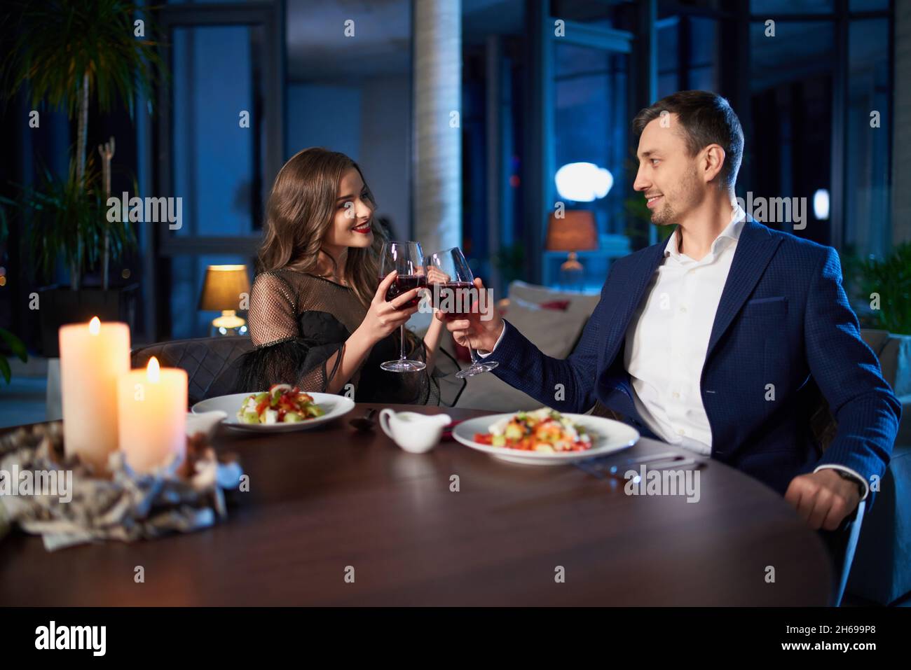 Man eating dinner suit hi-res stock photography and images - Alamy