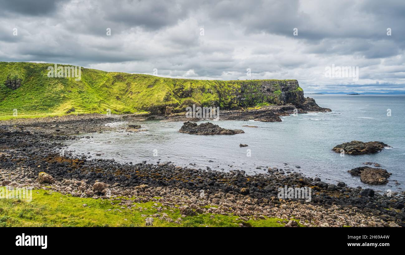 Basalt rocks and rough coastline with cliffs and rock formations of ...