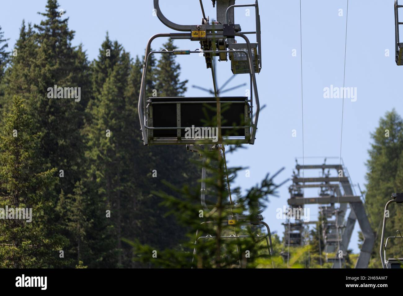 Arosa, Switzerland, August 15, 2021 Alpine chair lift is leading to the ...