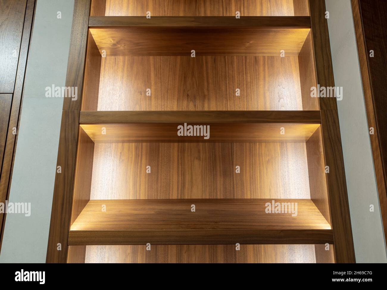 Modern interior of luxury apartment. Close-up of illuminated wooden ...