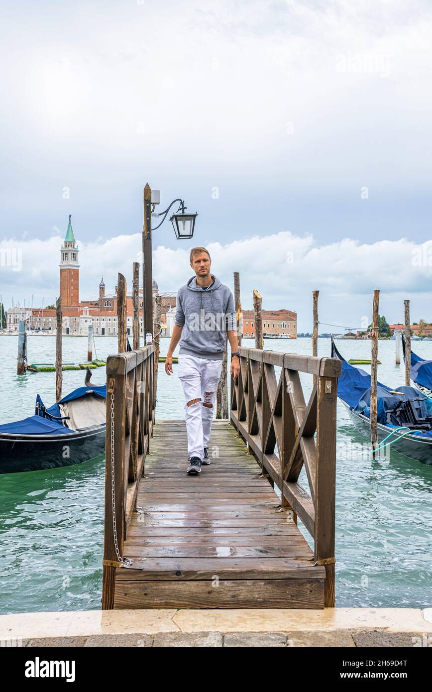 Man walking on pier hi-res stock photography and images - Alamy