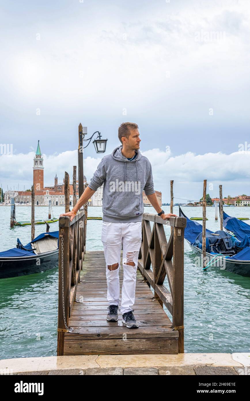 Man standing on pier hi-res stock photography and images - Alamy