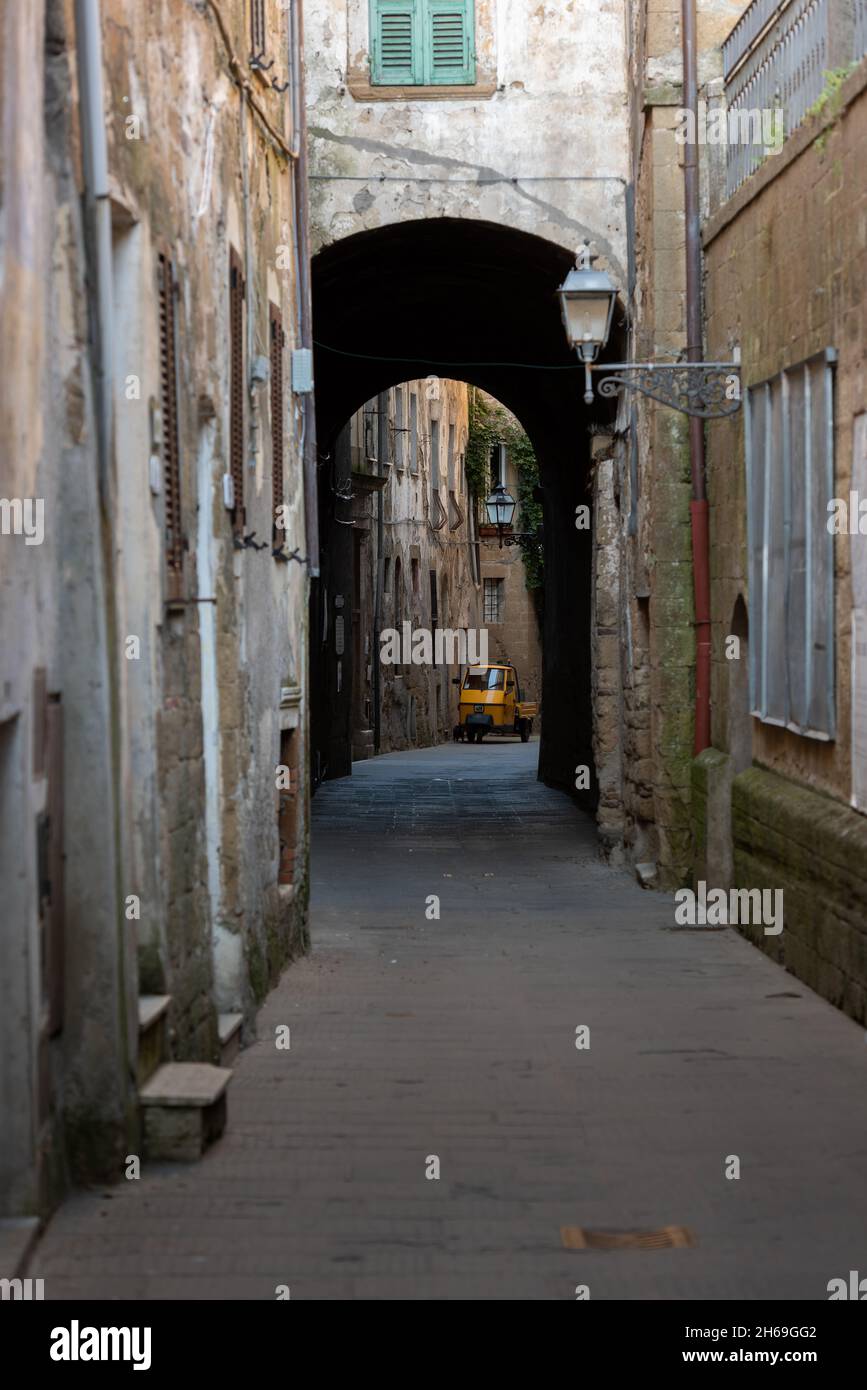 Narrow Italian street in old town Stock Photo - Alamy
