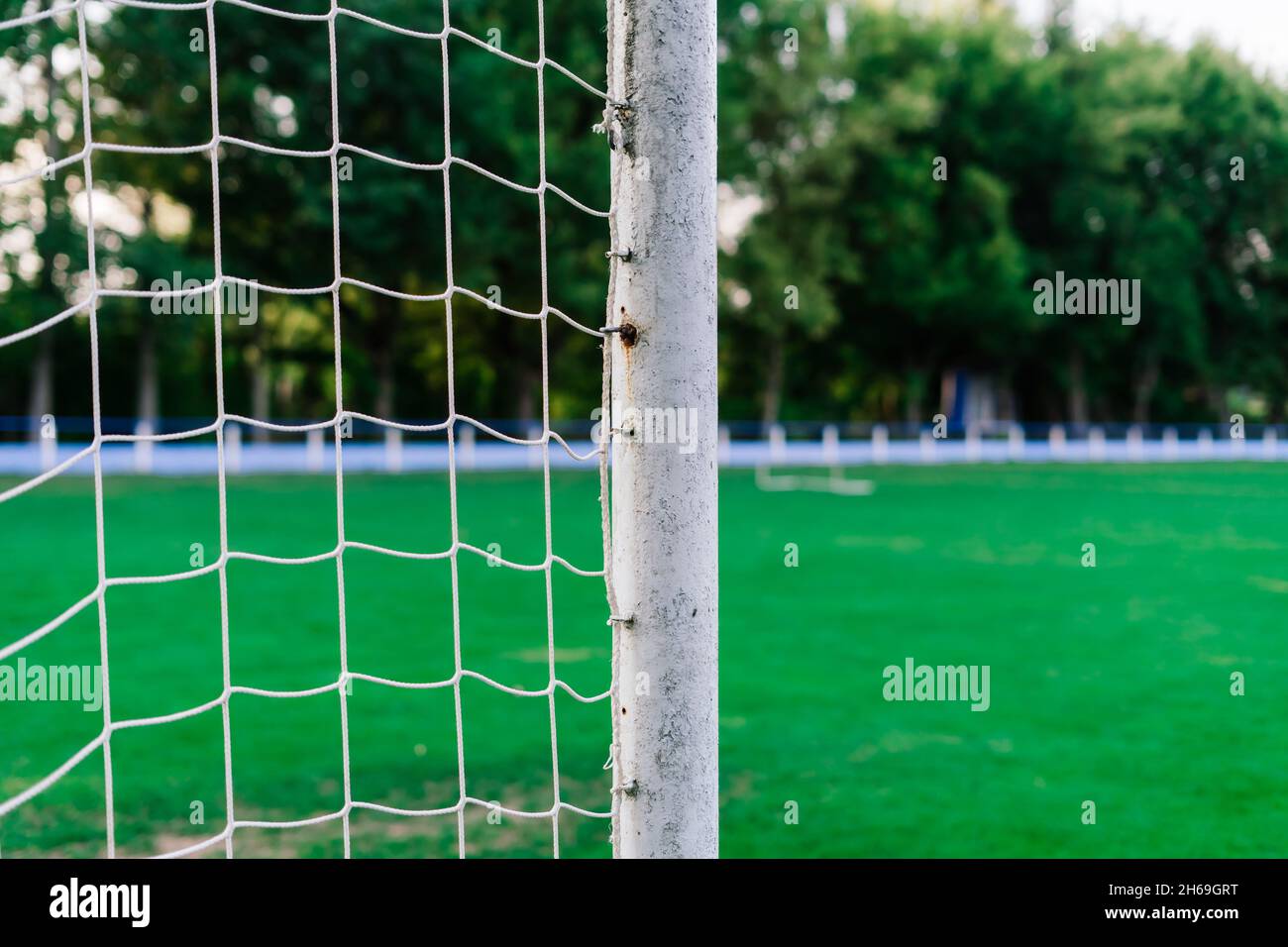Training soccer field with a green turf. Football field with goals and ...