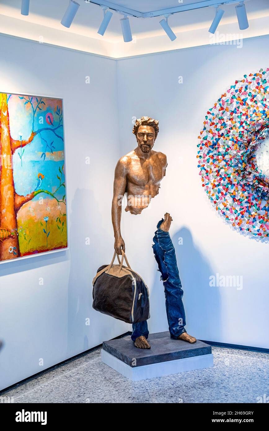 Bizarre incomplete human statue and painting on display at ravagnan ...