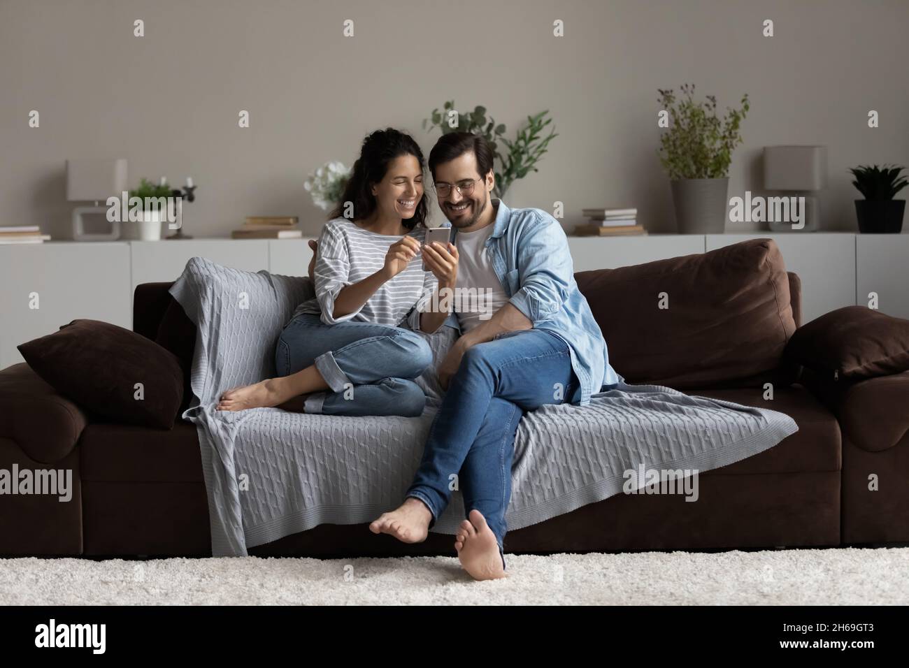 Happy family having home hi-res stock photography and images - Alamy