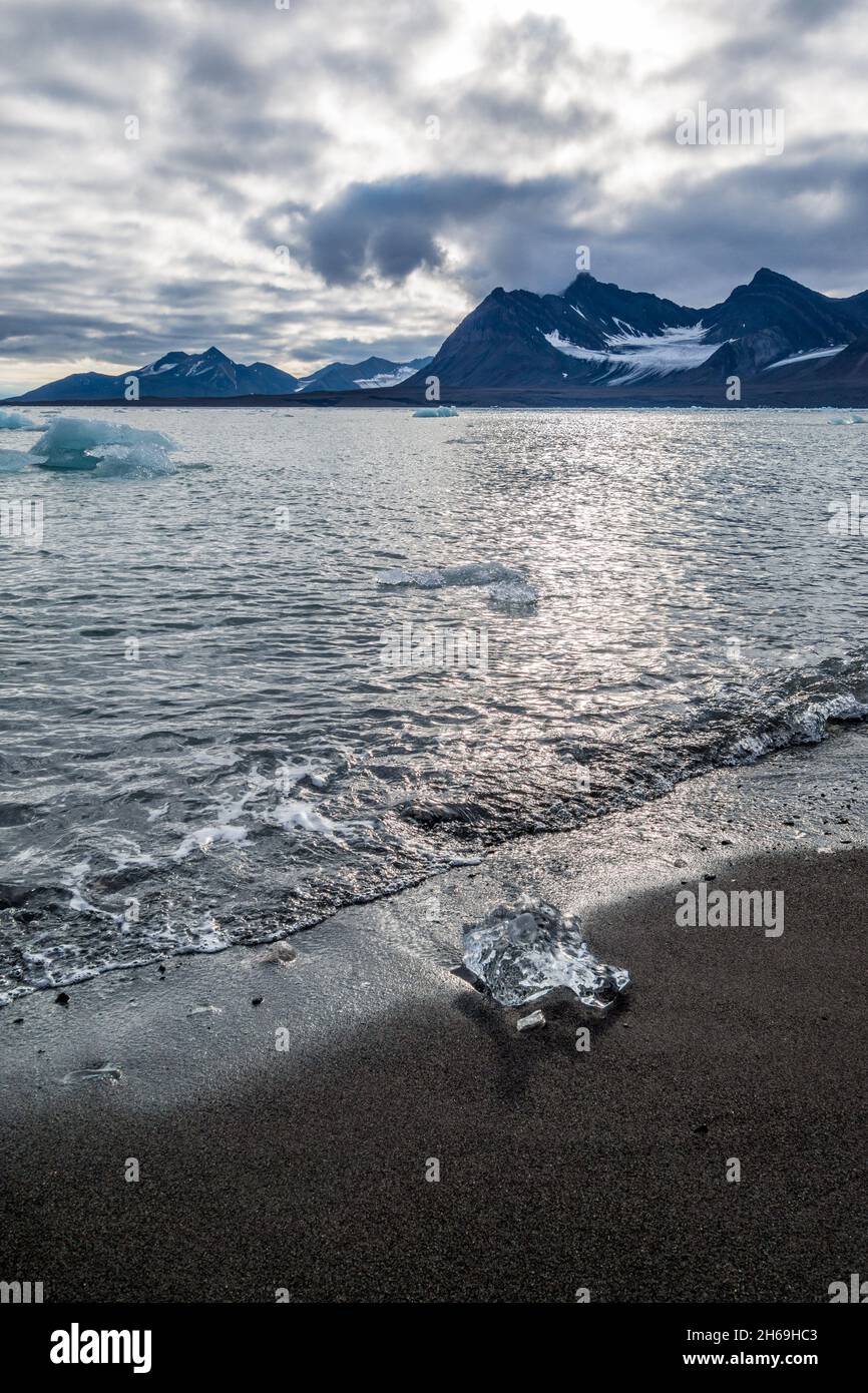 Small icebergs in front of a glacier, Svalbard Stock Photo - Alamy